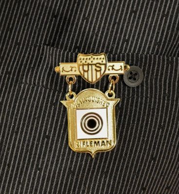 Frank Gill Honors Late Friend by Earning Distinguished Rifleman Badge